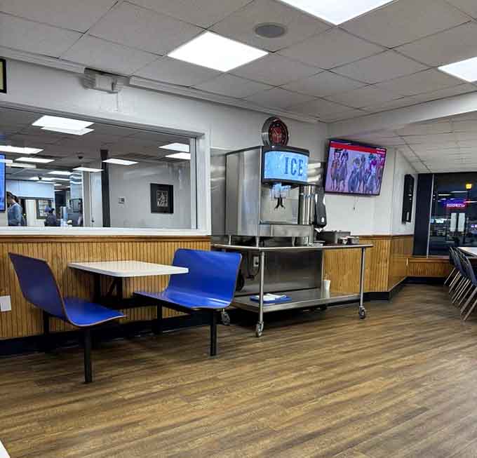 Simple booths, clean lines, and a view of where the magic happens. No frills, just thrills.