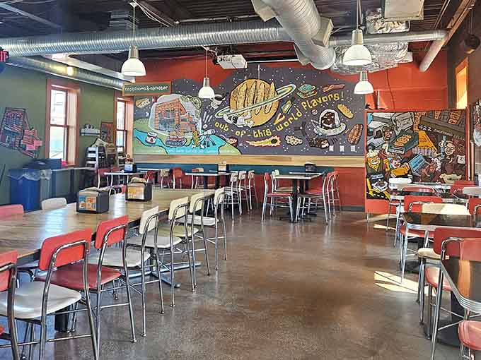 Vibrant murals and communal seating create the perfect backdrop for your legendary sandwich experience.