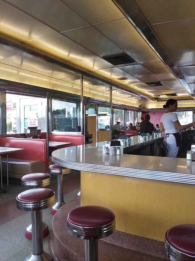 Chrome stools and red vinyl booths create the perfect stage for morning magic to unfold before your eyes.