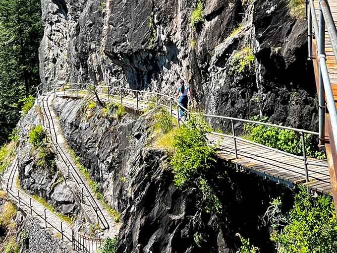 Clinging to the cliff face, this engineering marvel of a trail makes you feel like you're walking on air while safely secured by sturdy handrails.