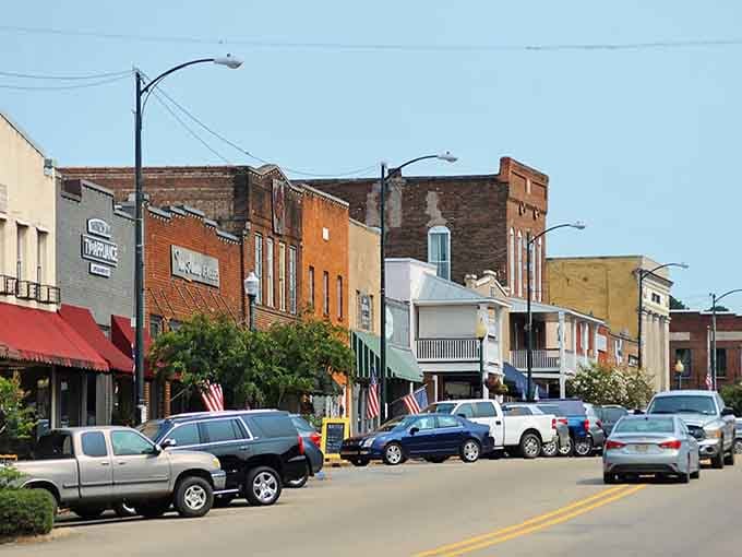 Main Street's colorful facades create a real-life Norman Rockwell painting where locals actually shop, dine, and gather rather than just passing through on their way somewhere else.