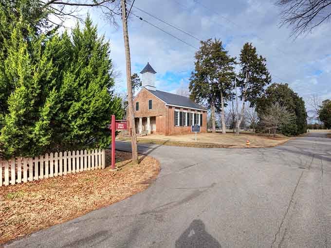 The Brick Church stands sentinel behind its white picket fence, a postcard-perfect example of 19th-century craftsmanship that's been witnessing Alabama history since Martin Van Buren was president.