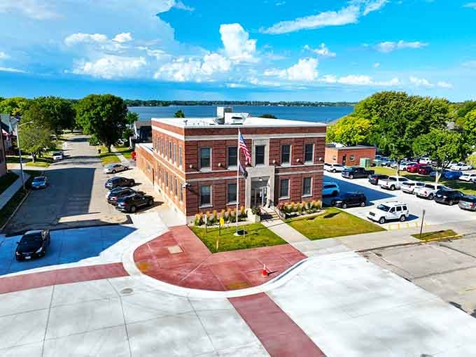 That brick building with the American flag proves small towns know how to maintain their heritage without turning everything into condos.