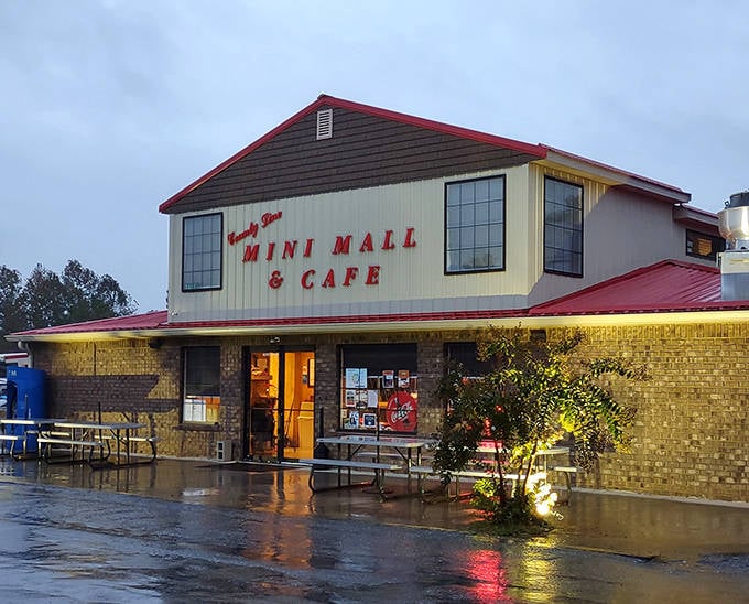 The County Line Mini Mall & Cafe welcomes treasure hunters rain or shine. That warm glow promises both bargains and comfort food inside.