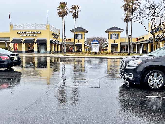 American Eagle Outfitters reflects in rain-slicked pavement, creating a mirror image of savings. Even Mother Nature wants to double the shopping opportunities.