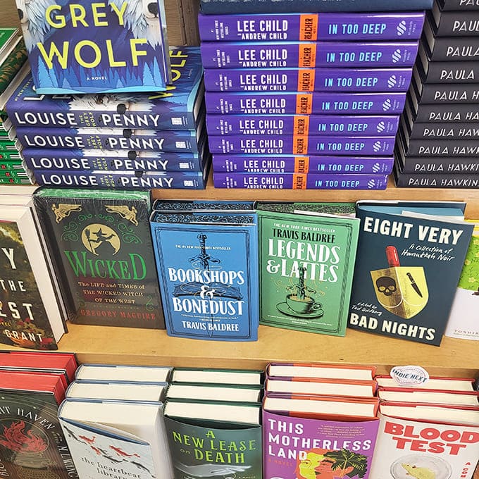 Bestsellers stand at attention like literary soldiers, with Louise Penny and Lee Child leading the mystery brigade.