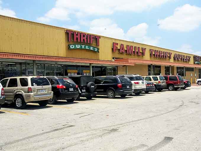 Bargain paradise awaits behind these yellow walls. The parking lot's diverse vehicles tell the story&mdash;thrifting transcends all economic boundaries in Houston.