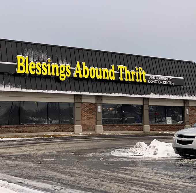 Winter can't dampen the thrill of the hunt—the bright yellow sign cuts through gray skies like a promise of warmth and wonderful finds inside.