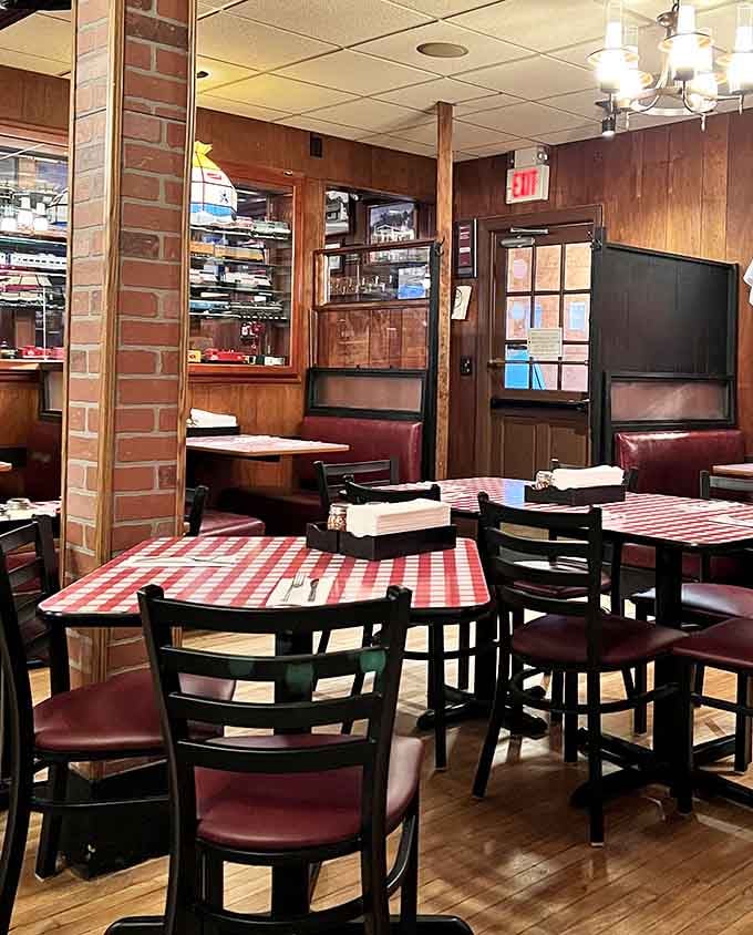 Step inside and time stands still. Red checkered tablecloths, wood paneling, and the promise of comfort food create the perfect escape from modern dining trends.