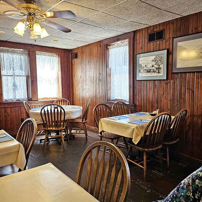 Wood-paneled walls and Windsor chairs create the perfect time machine to transport you back to Grandma's dining room.