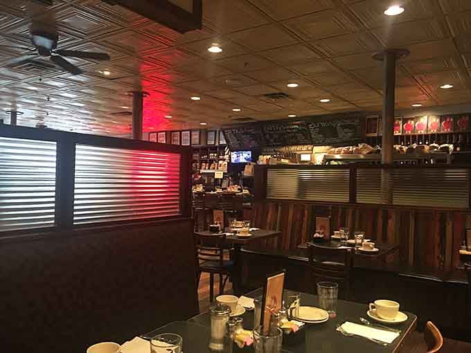Inside Zaftigs, time slows down as the warm glow of pendant lights illuminates decades of delicious decisions. The tin ceiling and wooden booths create that perfect "where everybody knows your name" vibe.