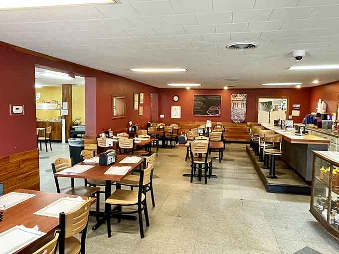Inside, burgundy walls and classic diner seating create that perfect nostalgic atmosphere where conversations flow as freely as the coffee.