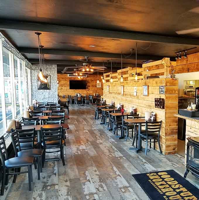 Rustic wooden walls and weathered floors tell stories of countless BBQ pilgrimages. This isn't interior design&mdash;it's a temple dedicated to the art of smoke.