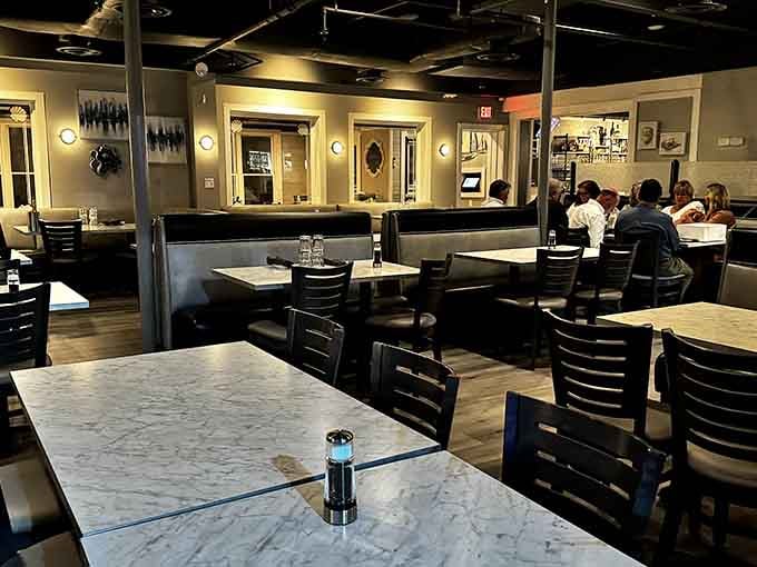 Marble tabletops and comfortable seating create that rare sweet spot between casual enough for flip-flops and nice enough for date night.