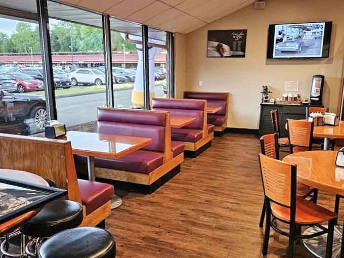 Comfortable booths and warm wood tones create that "come as you are" vibe where the only dress code is an empty stomach.