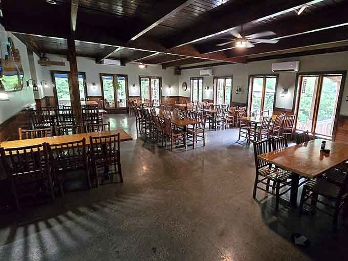 Those windows framing the river view turn every meal into dinner theater, starring Mother Nature herself.