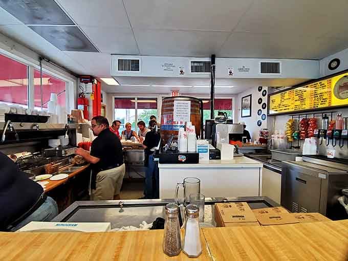 The open kitchen means you can watch your lunch being made, which is either reassuring or terrifying depending on your trust issues.