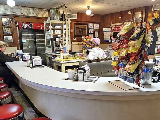 The horseshoe counter isn't just seating&mdash;it's a front-row ticket to the greatest show in Ottumwa: sandwich artistry in action.