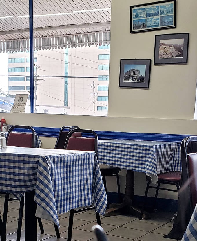 Blue checkered tablecloths and framed memories create that "grandma's kitchen" feeling&mdash;minus the interrogation about why you're still single.
