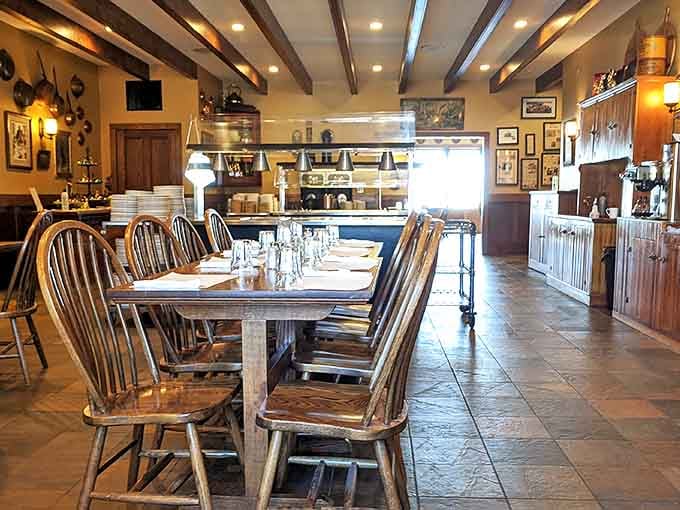 Wooden beams, Windsor chairs, and walls adorned with history &ndash; this dining room has witnessed more family celebrations than a lifetime of Thanksgiving dinners.