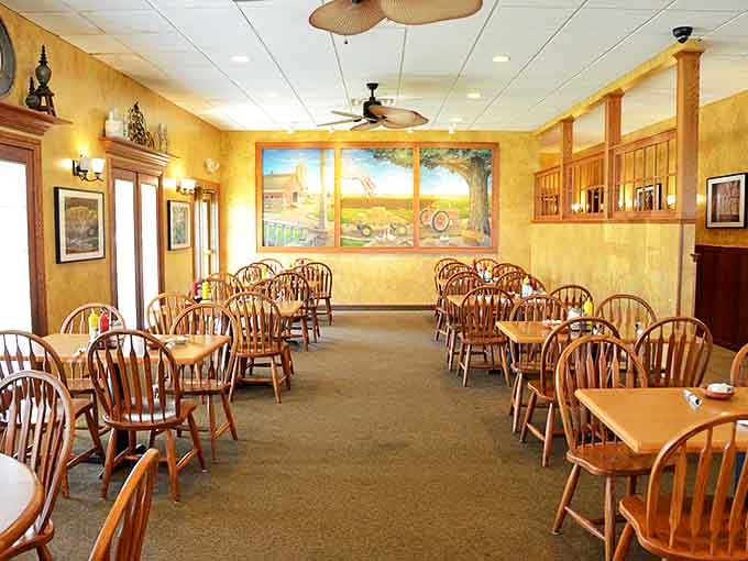 Windsor chairs and warm yellow walls create the perfect backdrop for conversations that flow as easily as the coffee refills.