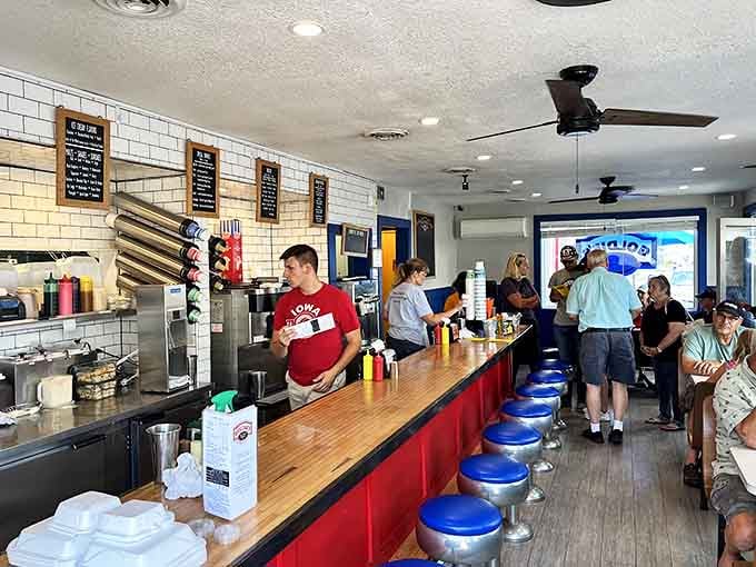 Classic Americana at its finest&mdash;blue counter stools, subway tile walls, and staff who move with the choreographed precision of a small-town ballet.