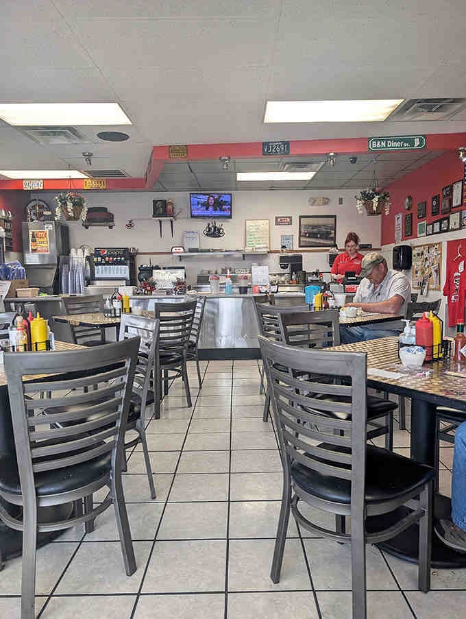 Classic diner perfection: checkered tables, ladder-back chairs, and that unmistakable feeling you've just walked into your favorite aunt's kitchen.