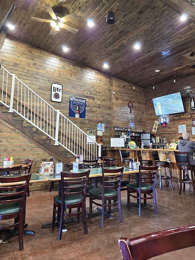 Rustic wooden walls and ceiling create the perfect backdrop for comfort food conversations. It's like dining inside a cozy cabin that happens to serve incredible meals.