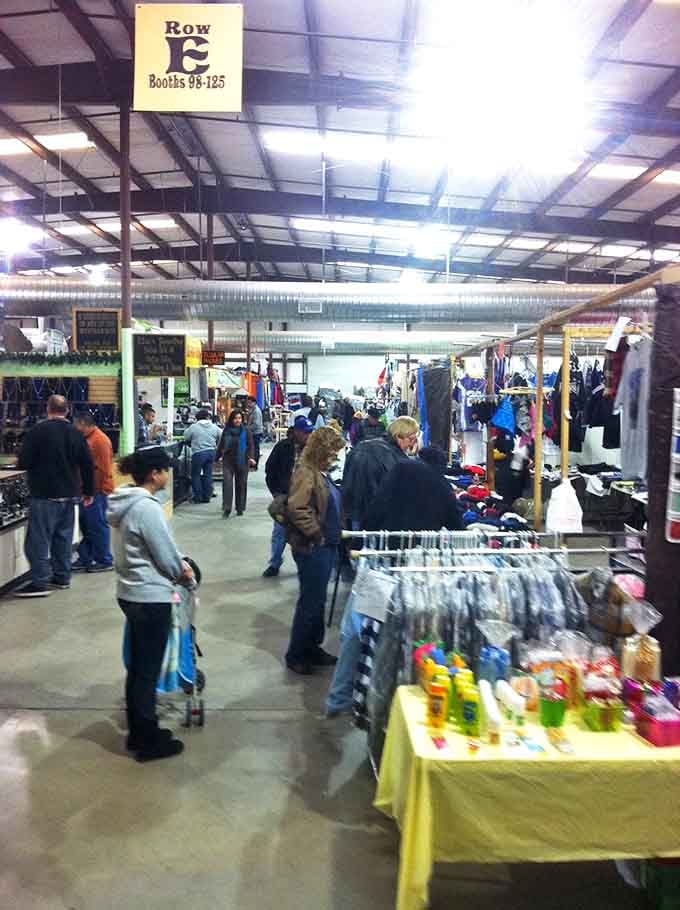 The indoor bazaar bustles with weekend warriors on the hunt. Row E's numbered booths create a treasure map where X marks the bargain.