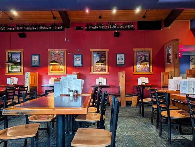 Inside, vibrant red walls adorned with framed memorabilia create the perfect backdrop for pizza pilgrims. The wooden tables practically whisper, "Stay awhile, order seconds."