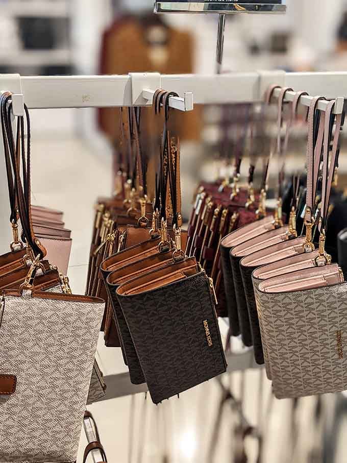 Designer handbags hanging like fashionable fruit, ripe for the picking at prices that won't require a second mortgage.