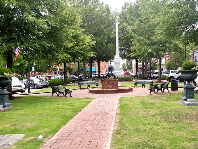 The town square's Confederate monument stands amid shady oaks and brick pathways, offering a peaceful spot to rest your feet after shopping or contemplate Southern history.
