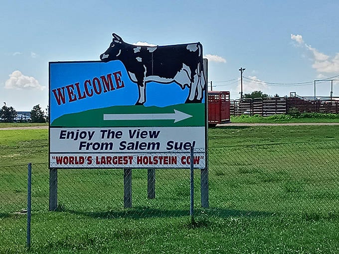 "World's Largest Holstein Cow" isn't just a title&mdash;it's a promise. This sign marks the beginning of your bovine adventure.