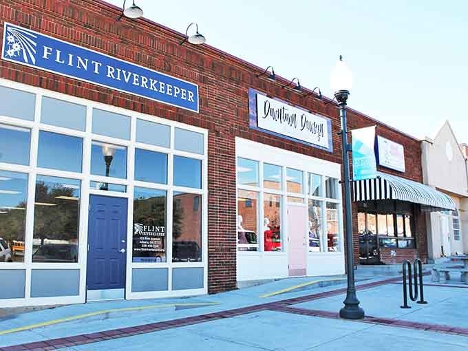 Fresh storefronts line clean sidewalks where local businesses thrive without charging big-city prices for small-town charm.