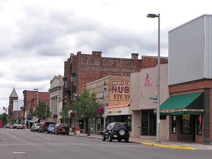 Faded ghost signs on brick walls whisper stories from when this waterfront town ruled the shipping world.