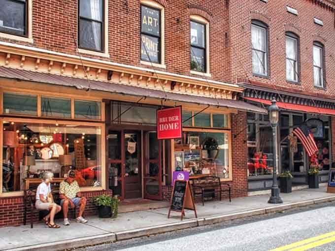 Those brick storefronts with their vintage awnings whisper stories of simpler times when Main Street meant something special.