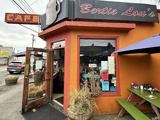This cheerful orange corner cafe radiates warmth like a sunrise, inviting you in for homestyle cooking done right.