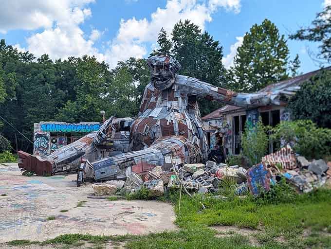 Big Rusty emerges from recycled wood and metal, transforming discarded materials into a towering guardian of environmental art.