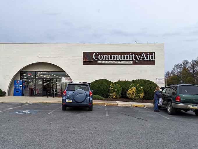That distinctive arched entrance looks like a portal to another era, where shopping meant community and purpose.