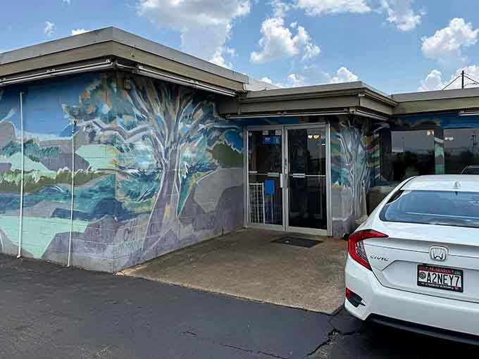 This stunning mural transforms a simple building into a work of art celebrating the natural beauty all around.