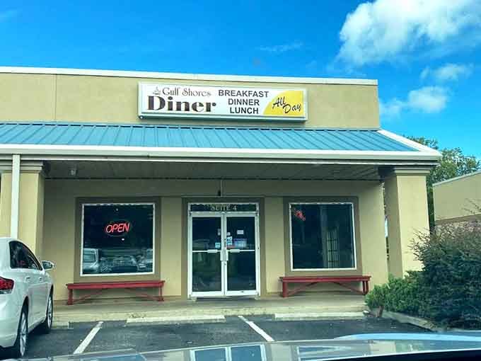 That cheerful yellow facade and blue roof practically shout "Come get some pancakes!" from across the parking lot.