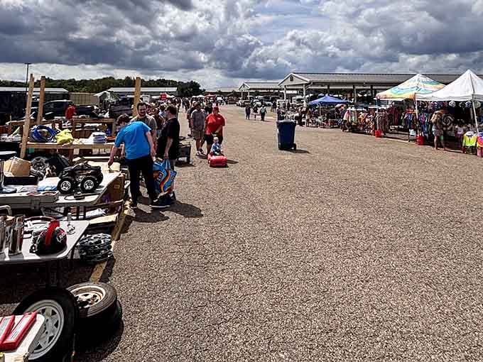 Under dramatic clouds, treasure hunters spread across this vast outdoor market like bargain-seeking pioneers heading west.