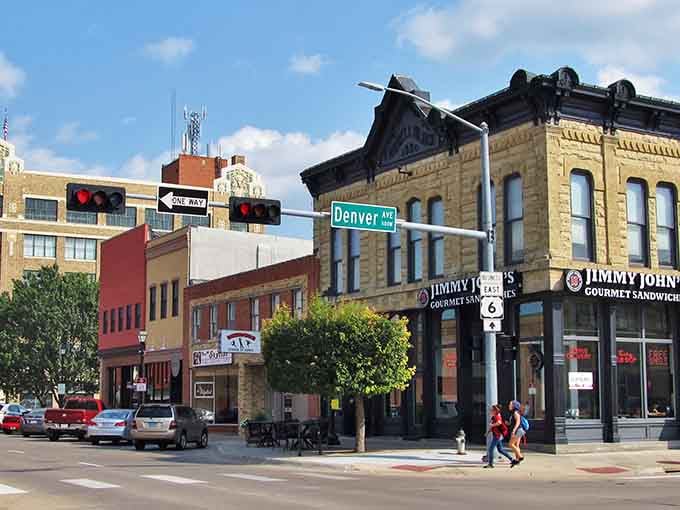 Hastings' vibrant downtown blends history with affordability, where Jimmy John's meets historic architecture on Denver Avenue.