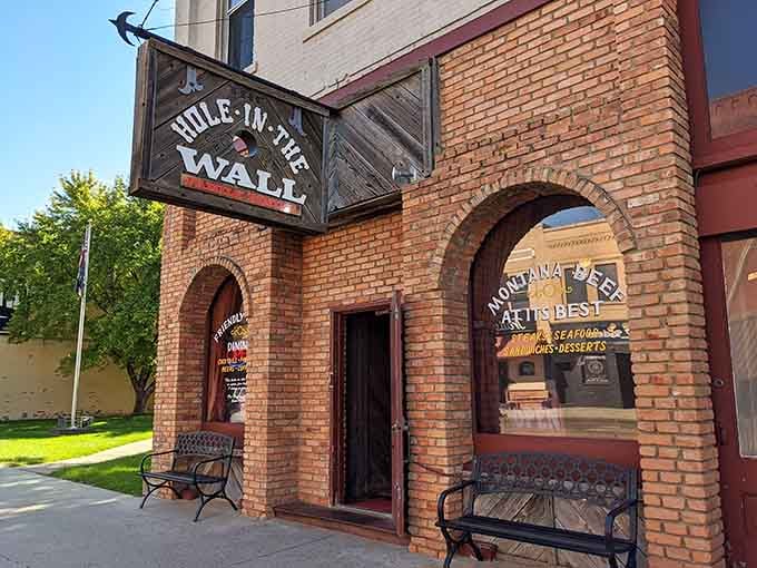 The aptly named "Hole in the Wall" lives up to its billing with this charming brick fa&ccedil;ade&mdash;architectural truth in advertising at its finest!