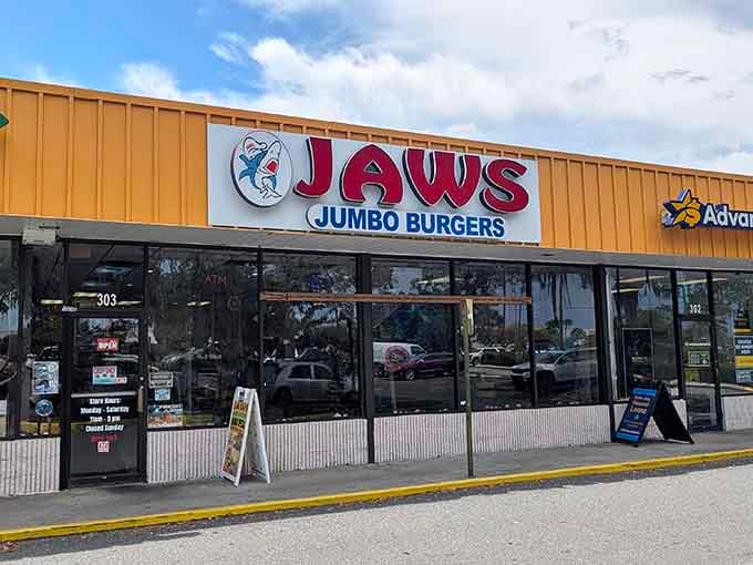 That shark logo means serious business when it comes to burgers that'll make your jaw drop, literally.