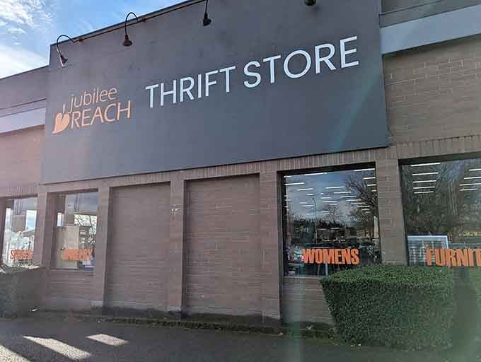 The modern storefront welcomes shoppers with clean lines and plenty of parking for your treasure-hunting expedition ahead.