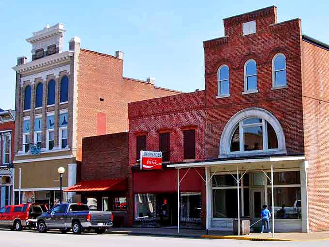 New Harmony's golden limestone buildings glow like butter in the afternoon sun, inviting peaceful exploration.
