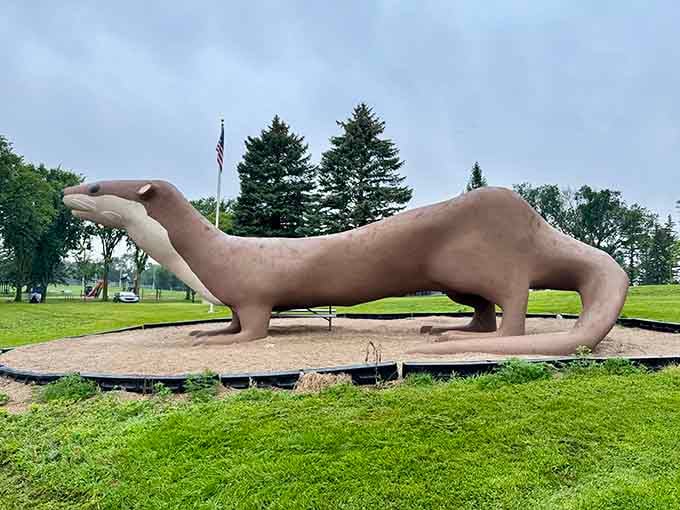 Otto the Otter stretches out for a permanent sunbath in Fergus Falls, looking surprisingly comfortable for being made of concrete.