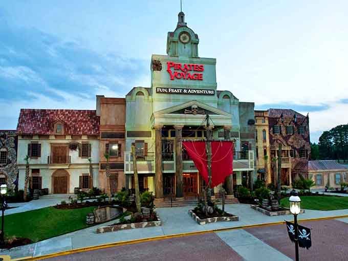 This grand pirate village rises like a movie set, complete with clock tower and crimson sails ready for adventure.