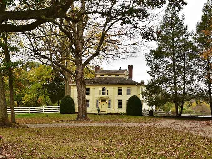 This colonial mansion sits beneath ancient trees like a scene from a Norman Rockwell painting come to life.